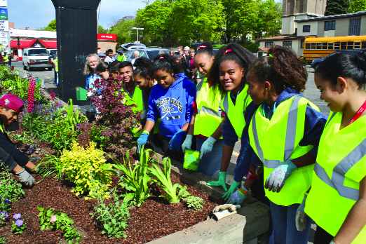 Visiting students plant garden downtown | News, Sports, Jobs - The ...